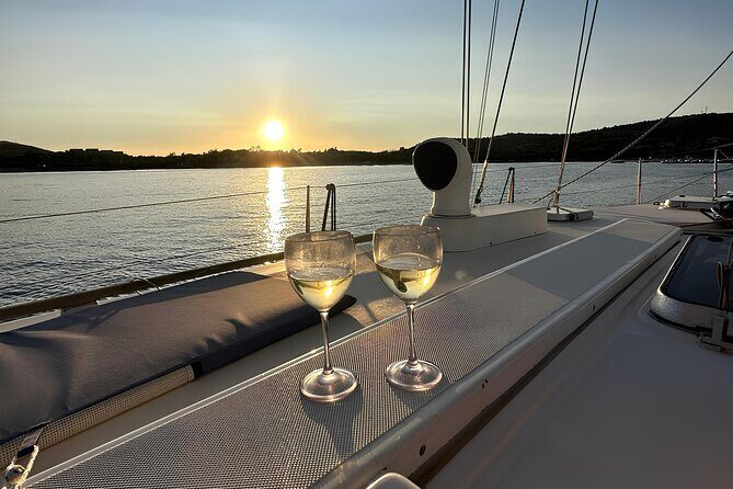 15m sailing boat trip at sunset of Alghero with Aperitif - Itinerary Breakdown