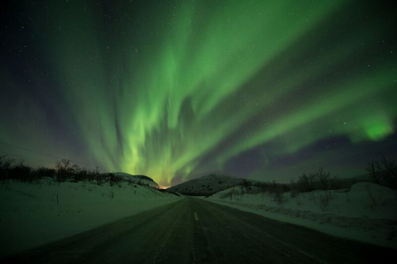 Abisko: Guided Aurora Chase with Hotel Transfers - Key Points