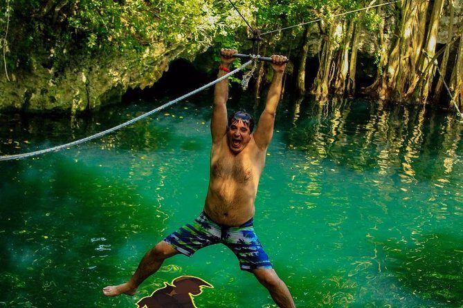 Adrenaline day driving ATVs doing Ziplines and swimming in a Cenote from Cancun - The Sum Up