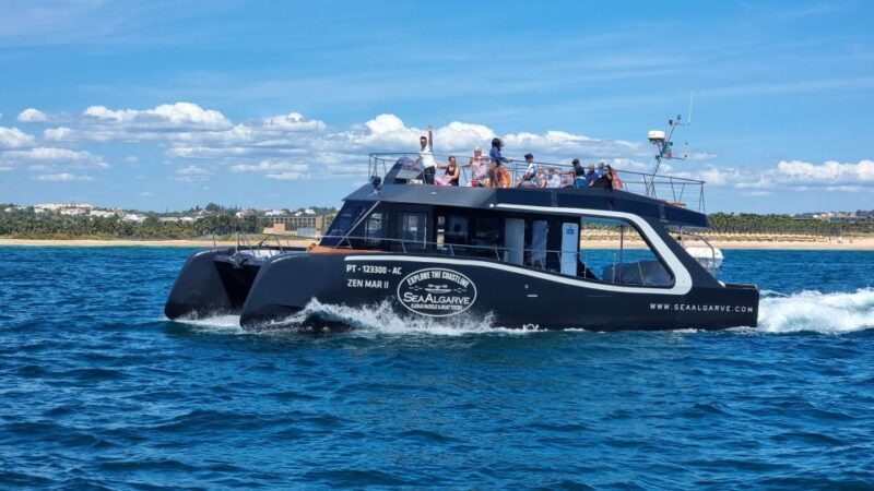 Albufeira: Coastline and Benagil Caves Tour by Catamaran - Music and Atmosphere Onboard