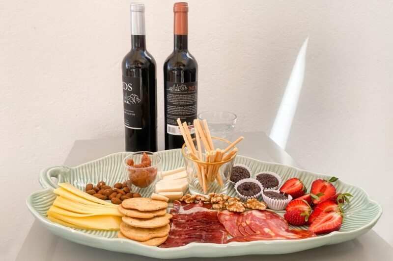 Albufeira/Porches/Vilamoura: Wine Tasting with Tapas & Music - The Sum Up