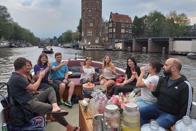 Amsterdam canal cruise in open boat  Guided tour - The Experience: From Booking to Boarding