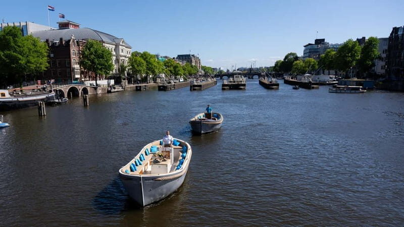 Amsterdam: Canal Cruise in Open Boat with Drink Option - What to Expect During the Tour