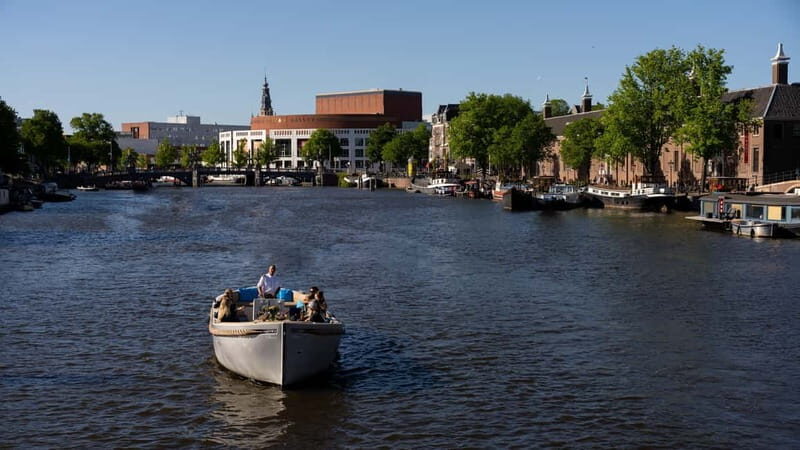 Amsterdam: Canal Cruise in Open Boat with Drink Option - Authentic Insights from Reviews