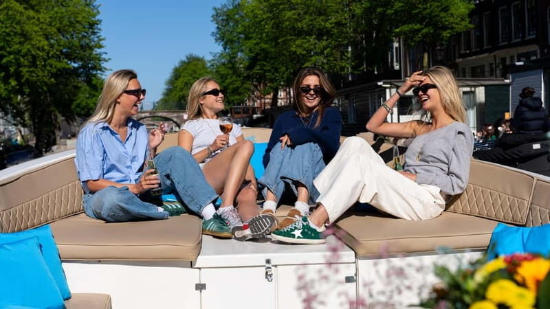 Amsterdam: Canal Cruise in Open Boat with Drink Option - Who Will Love This Experience?
