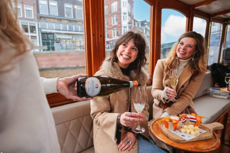 Amsterdam: Canal Cruise with Bubbles & Bites - Key Points