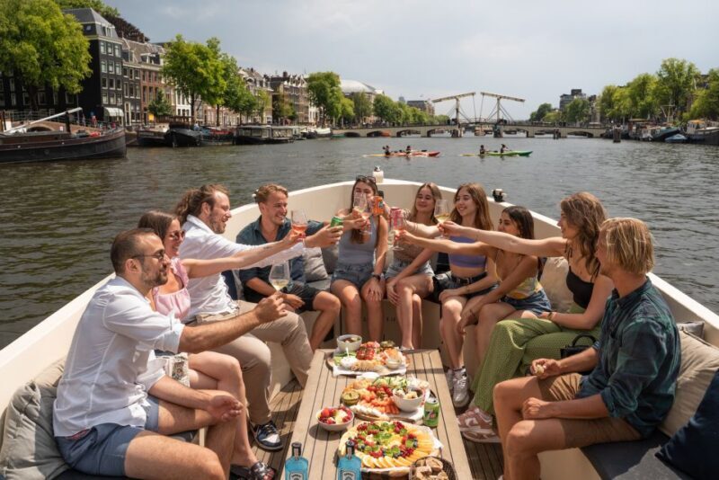 Amsterdam: German Guided Canal Cruise with on Board Bar - Discover Amsterdam from the Water: A Detailed Review of the German Guided Canal Cruise