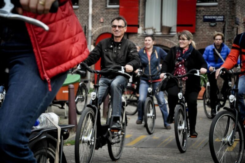Amsterdam: Guided City Bike Tour in French - Why This Tour Offers Great Value