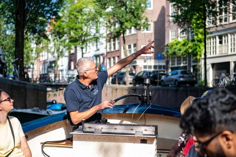 Amsterdam: Guided City Highlights Open Boat Canal Cruise - Key Points