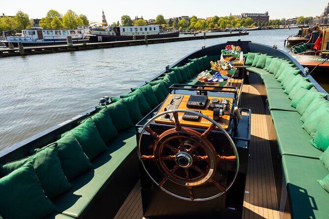 Amsterdam: Guided Open Boat Canal Cruise Unlimited Drinks Option - Key Points