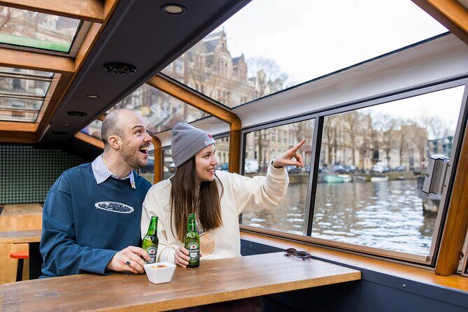 Amsterdam Heineken Cruise with 1 Heineken, Snacks, Live Guide - An Overview of the Experience