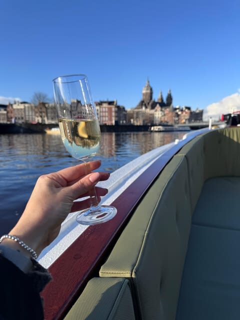 Amsterdam: Historic Boat Cruise with open bar and nibbles - What You Can Expect During the Tour