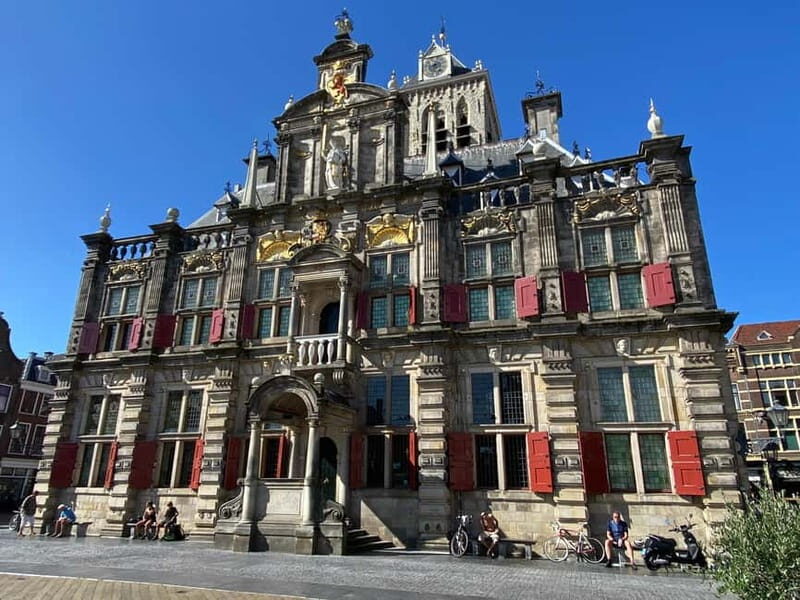 Amsterdam: Kinderdijk, Euromast, Delft and Den Haag Day Tour - Authentic Experiences and Respect for Holland’s Heritage