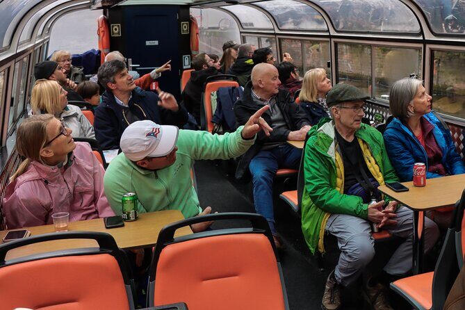 Amsterdam Live Guided Sightseeing Canal Cruise - Key Points