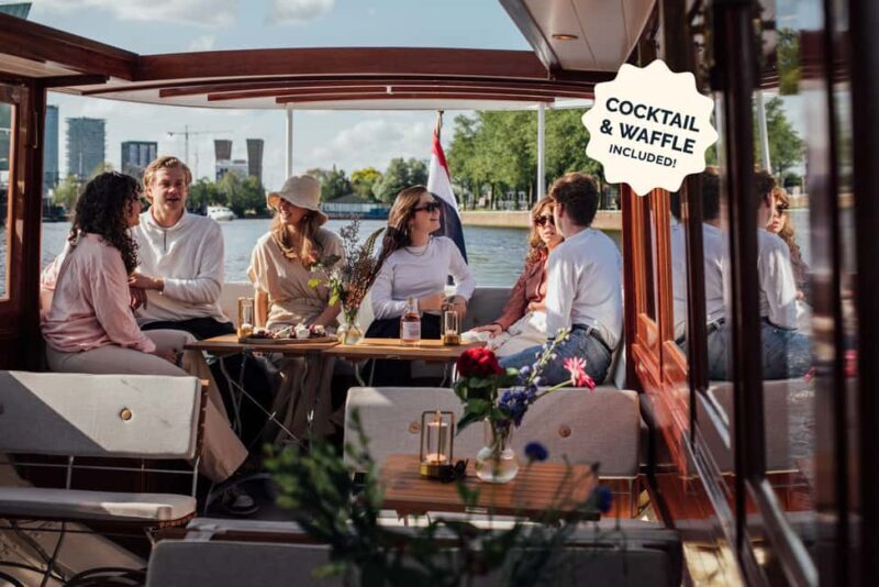 Amsterdam: Luxury Saloon Boat Cruise with Cocktails & Waffle - Drinks, Snacks, and Atmosphere