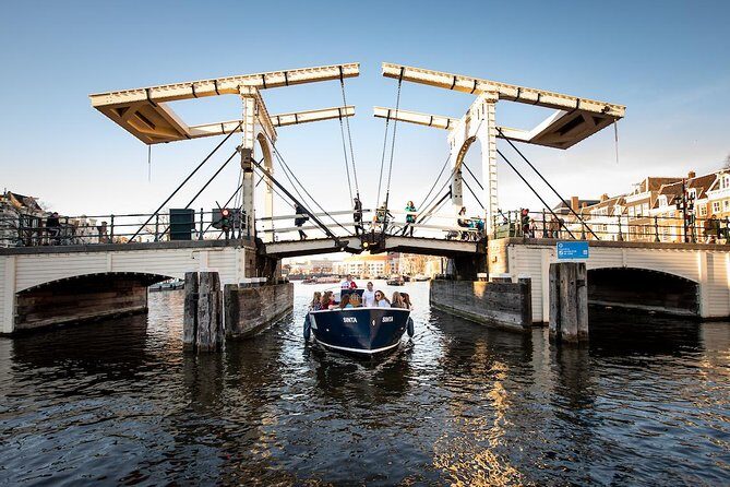Amsterdam Open Boat Cruise in Old City Center with Live Guide - What to Expect on the Tour