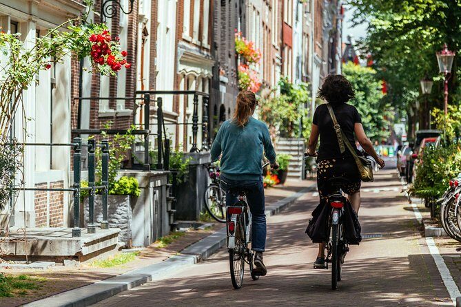 Amsterdam PRIVATE Bike Tour With Locals: Bike & Local Snack Included - FAQ
