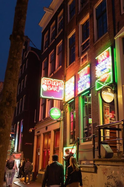 Amsterdam: Red Light Tour Exclusive + Peep Show - Exploring the Red Light District in Depth