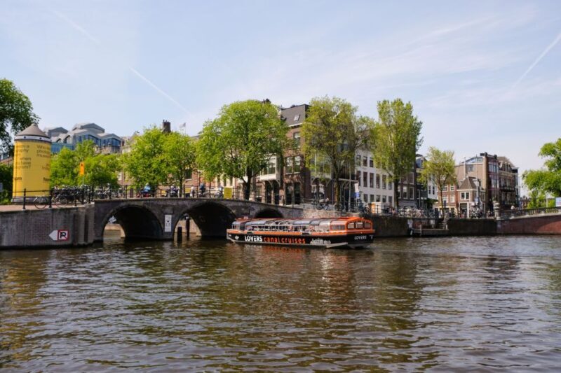 Amsterdam: Semi-Open Canal Boat Cruise - Overall Experience and Atmosphere