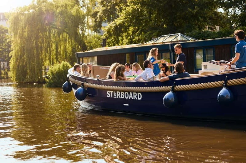 Amsterdam: Spanish Guided Open Boat Cruise with Bar Onboard - A Closer Look at the Experience
