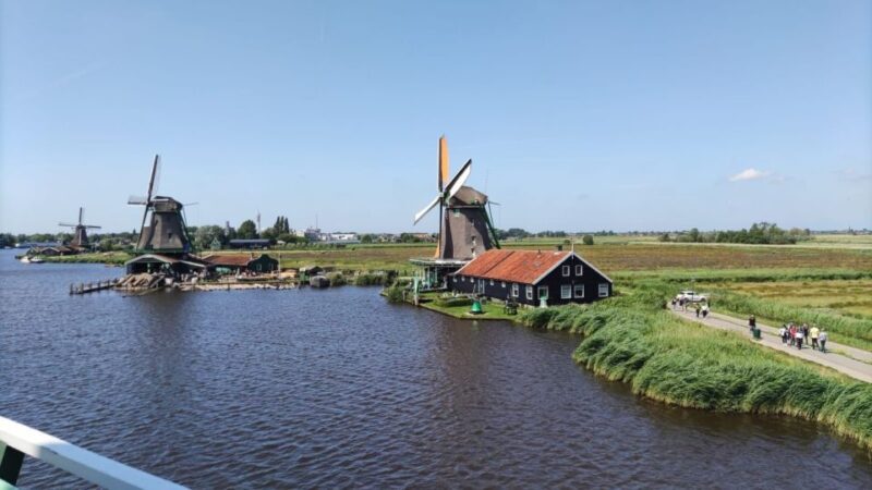 Amsterdam: Zaanse Schans Windmills Bike Tour with Guide - Visiting Iconic Windmills and Crafts