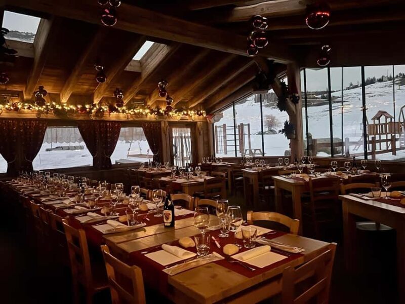 Aosta Valley Snowmobile Transportation and Dinner in Torgnon - Key Points