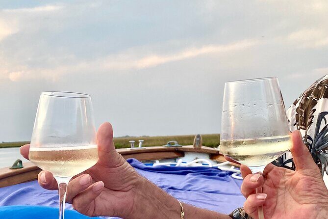 Aperitif at sunset in the Venice lagoon on a private boat. - Key Points