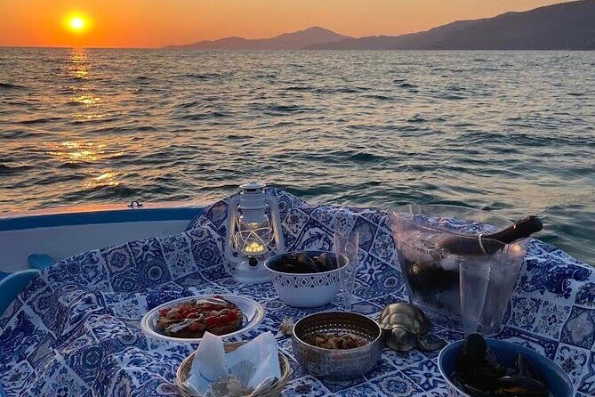 Aperitif on a boat at sunset in Palinuro - The Sum Up