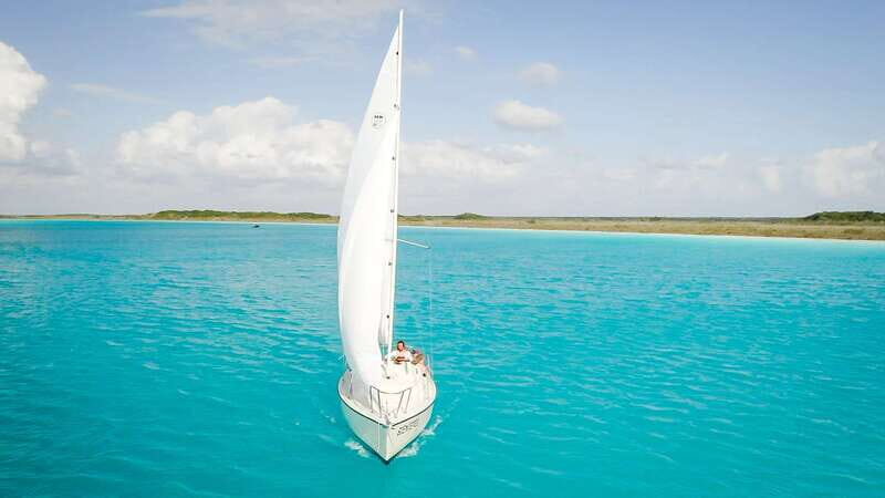 Bacalar: Group Sailing Trip with Swimming and Drinks - The Sum Up