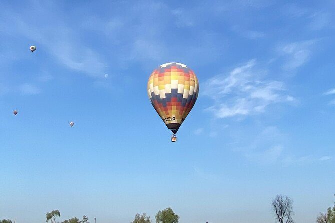 Balloon flight + Transportation + Breakfast in Cave or buffet + Pyramids - The Sum Up