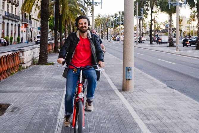 Barcelona Night Bike Tour with Local Tapas and Cava Stop - Detailed Breakdown of the Itinerary