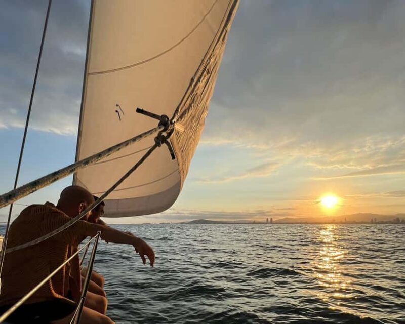 Barcelona: Sailing with Open Bar, Catalan Snack & Swim Stop - Key Points