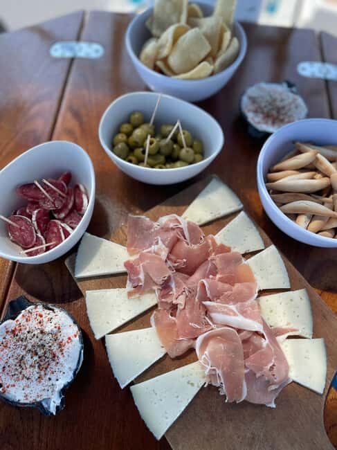 Barcelona: Sailing with Open Bar, Catalan Snack & Swim Stop - The Sum Up