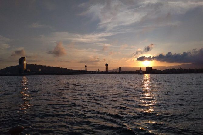 Barcelona Sunset Cruise with Light Snacks and Open Bar - A Relaxing Sail with Optional Swim Stops