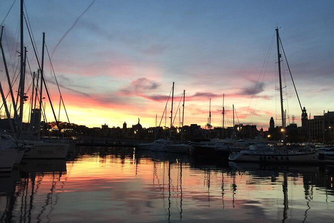 Barcelona Sunset Cruise with Light Snacks and Open Bar - Iconic Sights and a Gentle Return