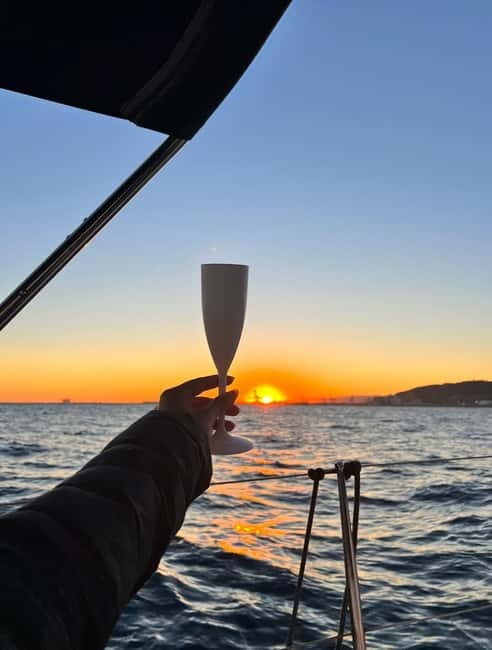 Barcelona: Sunset Sailboat Cruise with Open Bar and Snacks - Key Points