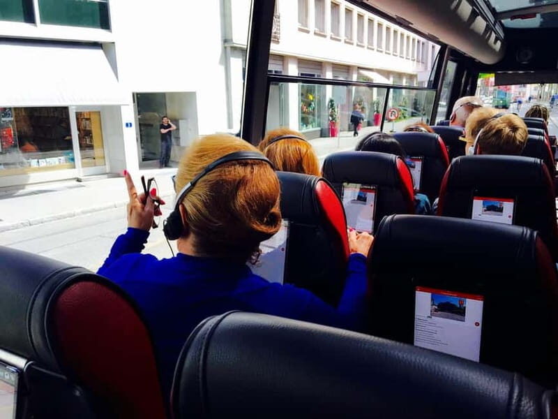 Basel: Sightseeing Bus Tour with Audio Guide - Key Points