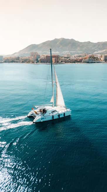 Benalmádena: Sailing & Dolphin Watching with Snacks/Drinks - Key Points