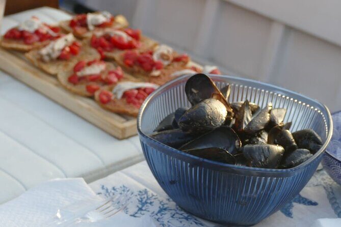 Boat experience in the crystal clear waters of Cilento - The Sum Up