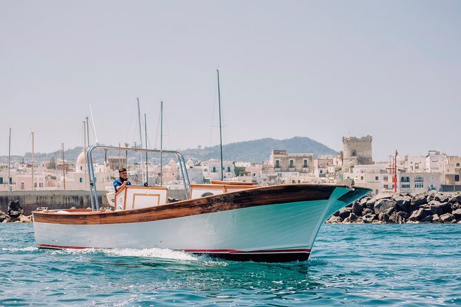 Boat tour of the island of Ischia with a typical Ischia 10-metre launch full day - The Sum Up