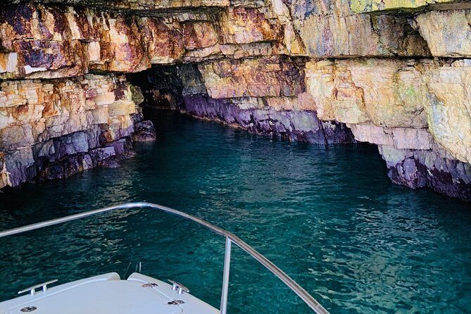 Boat tour of the Polignano a Mare caves with aperitif - Key Points