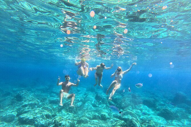 Boat tour with snorkeling and small aperitif in Alghero - The Practical Side: What to Expect