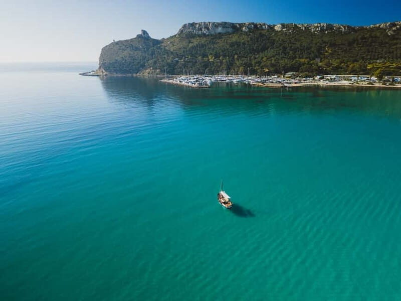 Cagliari: Gozzo Tour with 3 Swim Stops, Snorkel & Local Food - Key Points