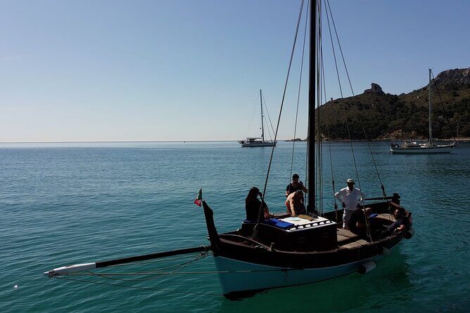 Cagliari Gulf Boat tour : 5 stops, snorkeling & local aperitif - The Sum Up