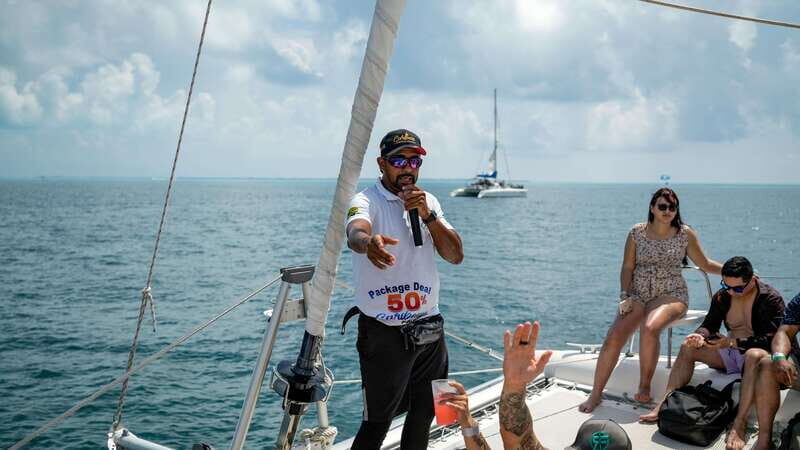 Cancún Catamaran to Isla Mujeres + Snorkel, Open Bar & Lunch - The Sum Up