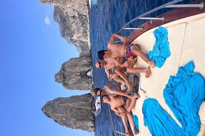 Capri half-day Private Tour from Sorrento - Premium 28ft Boat - Stop 4: The Faraglioni and Capris Iconic Cliffs