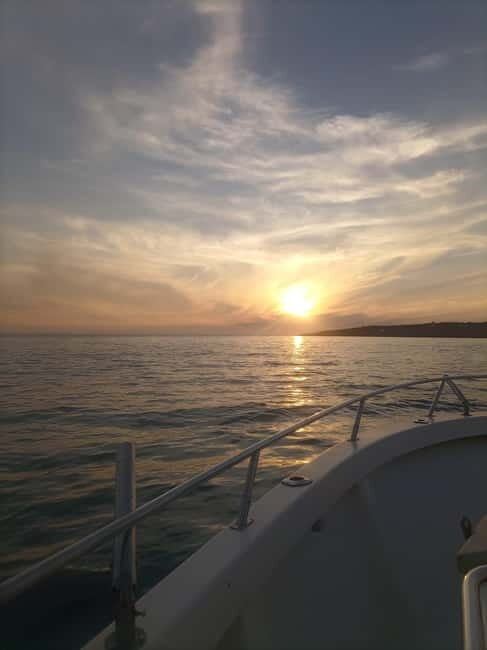 Cascais: Sunset Boat Trip with Welcome Drinks - The Sum Up