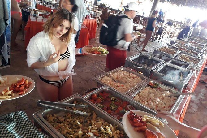 Catamaran Adventure Tour Isla Mujeres Unlimited from Cancun with Transportation - The Sum Up