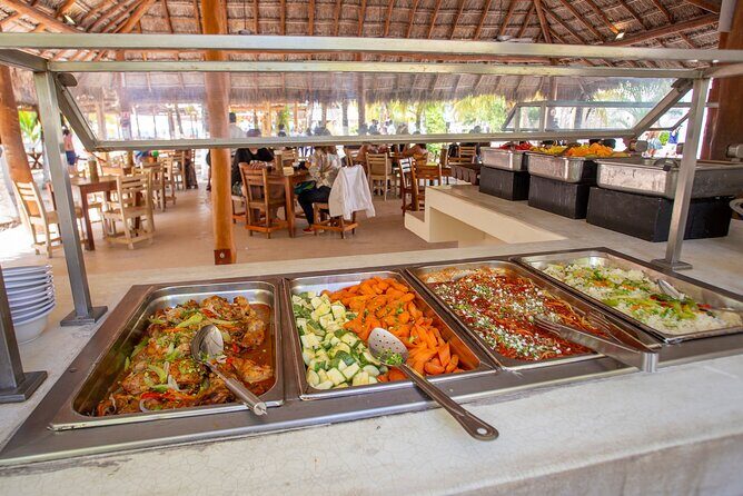 Catamaran family friendly Tour to Isla Mujeres with lunch - Key Points