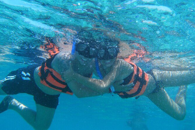 Catamaran family friendly Tour to Isla Mujeres with lunch - The Sum Up